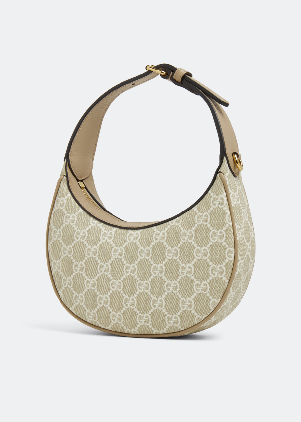 Gucci GG half-moon-shaped mini bag for Women - Beige in UAE | Level Shoes