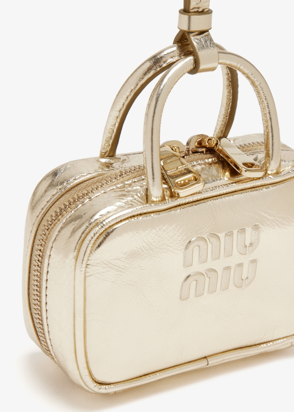Miu Miu Beau laminated leather micro bag for Women - Gold in UAE ...