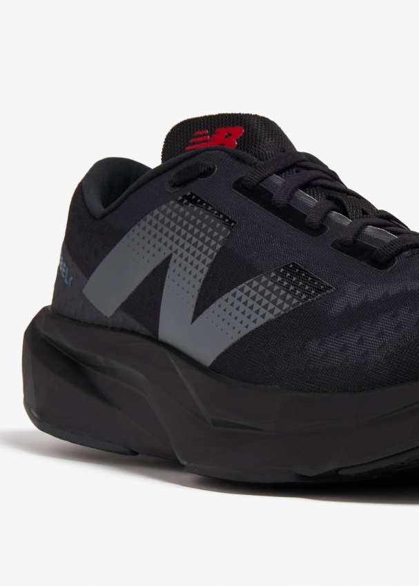 New Balance FuelCell Rebel v4 sneakers for Men - Blue in Qatar | Level ...