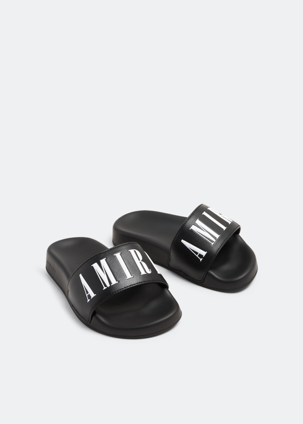 AMIRI Logo pool slides for Unisex - Black in UAE | Level Shoes