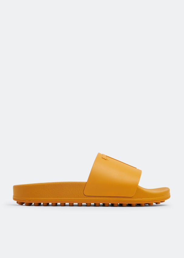 Tod's Monogram rubber slides for Men - Orange in UAE | Level Shoes